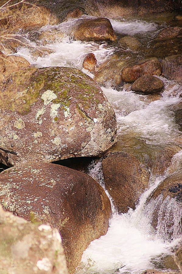 Water Flowing Over Rocks stock photo. Image of phenomenon - 97498268