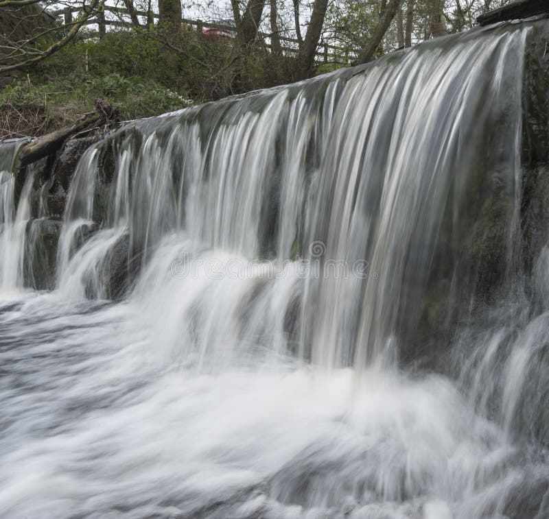 Water Flowing Over a Small Waterfall Stock Image - Image of stream ...