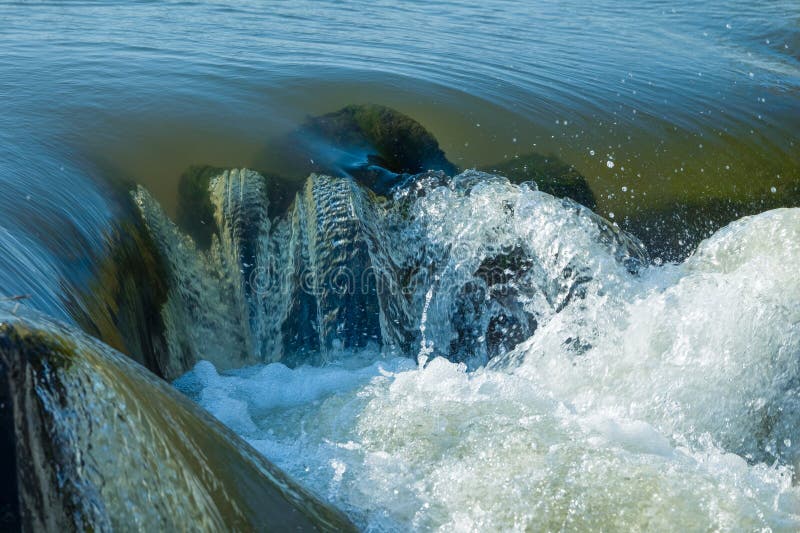 Water Flowing Over Submerged Rocks Stock Image - Image of transitions ...