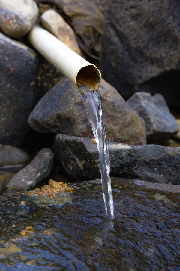 Water Flowing from a Paralon Pipe Stock Image - Image of stream, soil ...