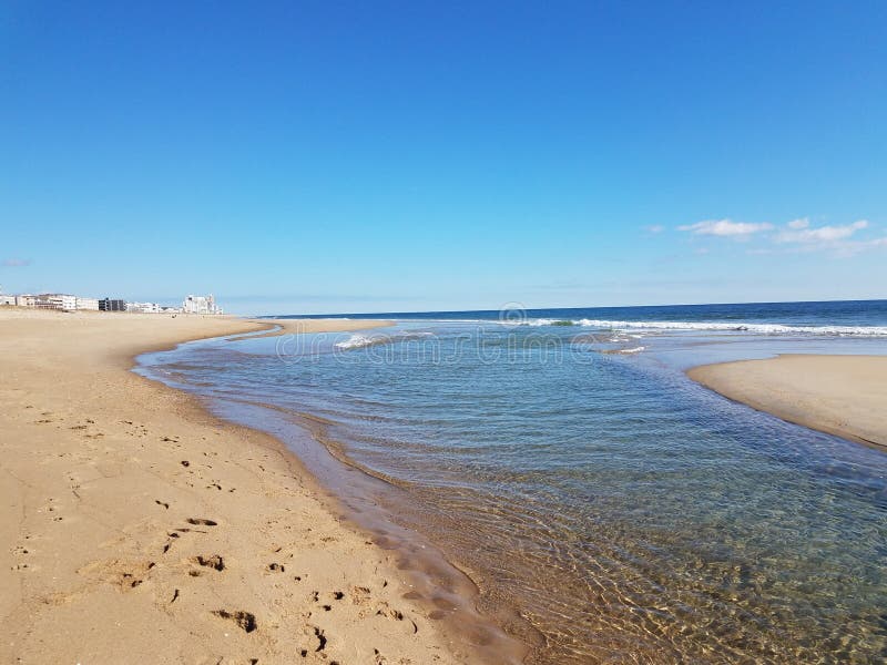 Water Flowing in River on Beach Near Ocean Stock Image - Image of ...