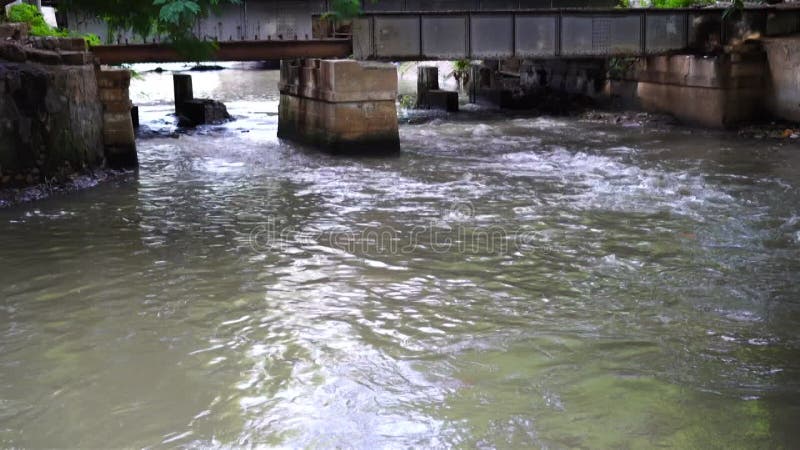River with Water Flowing Fast Under the Bridge. Stock Video - Video of ...