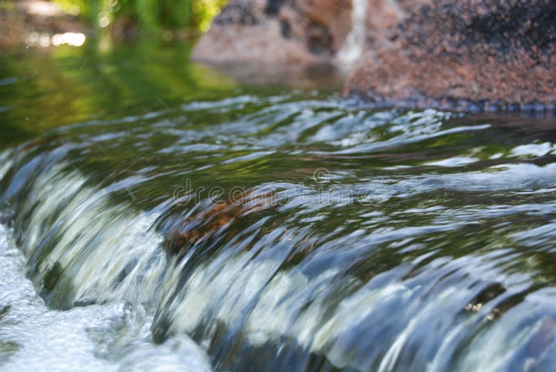 Water flowing in a river stock photo. Image of nature - 166495802