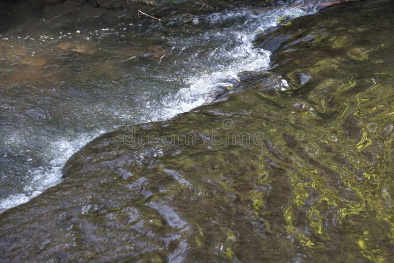 Water Flowing into the River Stock Image - Image of spring, flowing ...