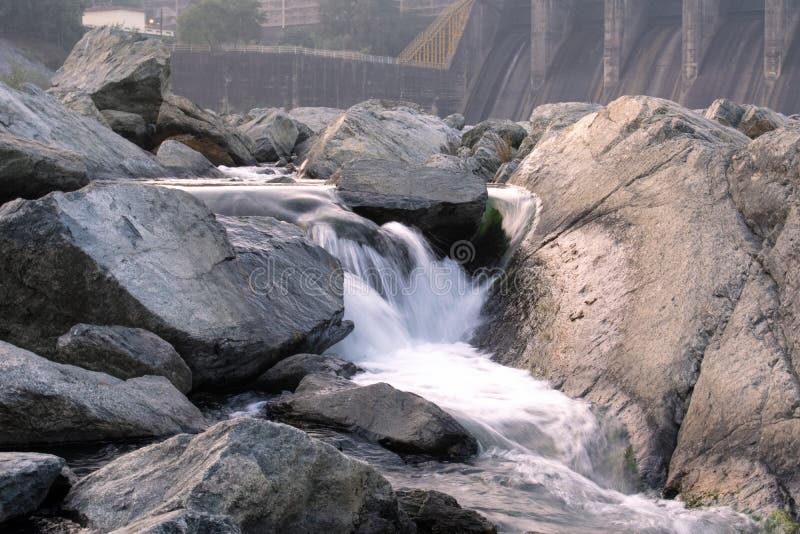 Water Flowing between the Rocks Stock Image - Image of flowing, giving ...