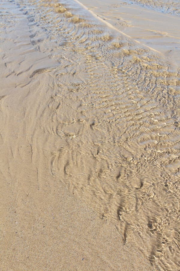 Water Flowing on the Sand of a Beach Stock Image - Image of coastline ...