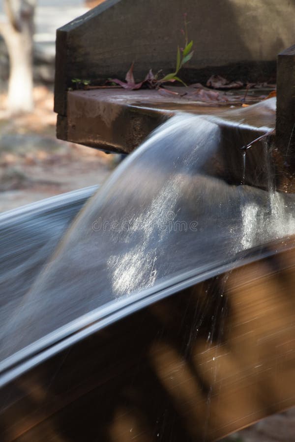Water flowing from a shute stock image. Image of flow - 45242883