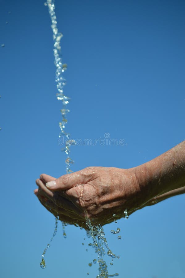 Water Flowing from the Sky into Open Hands Stock Image - Image of flow ...