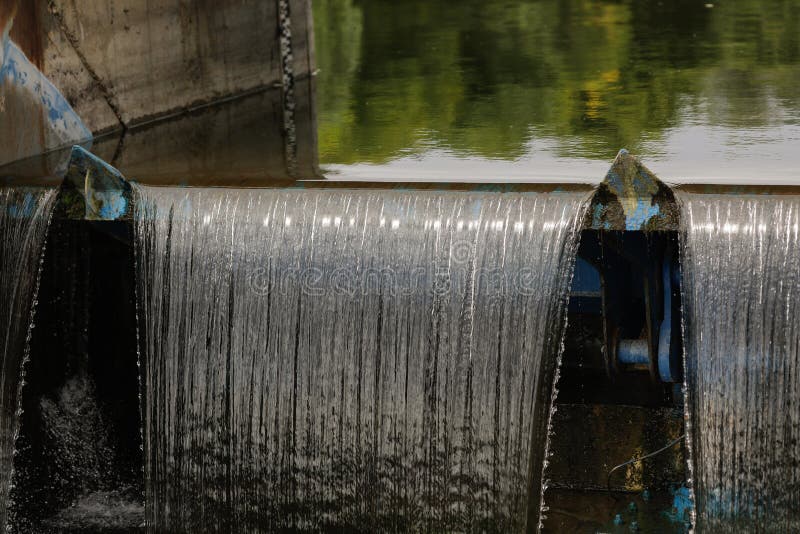 Water Flowing through a Sluice on a River Stock Photo - Image of ...