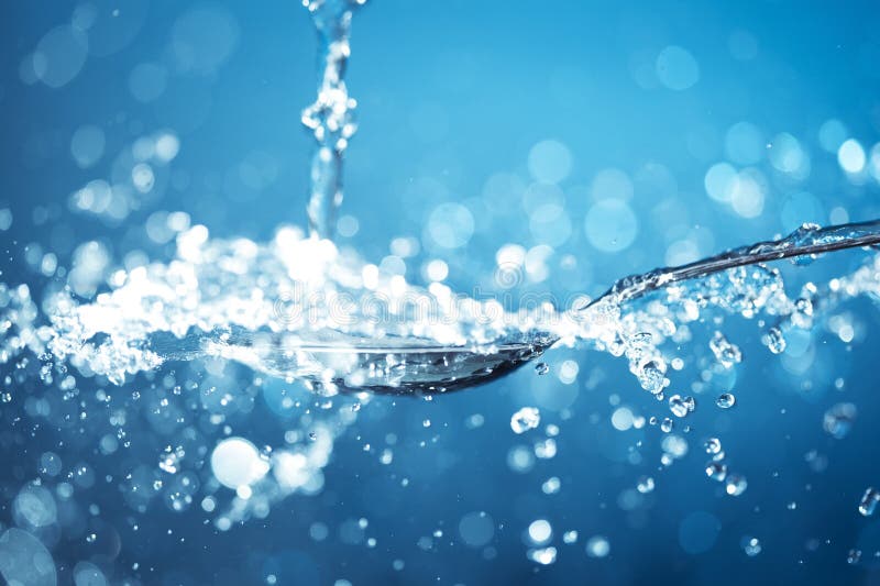 Water flowing on spoon stock image. Image of closeup - 12930311