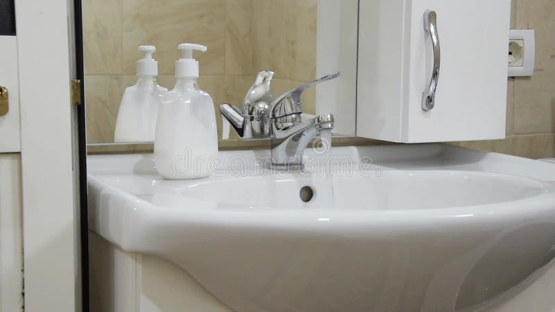 Water Flowing From The Tap In The Bathroom Stock Footage Video Of