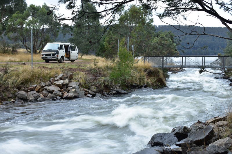 Water Flowing Under a Bridge Stock Photo - Image of riverbank, lake ...