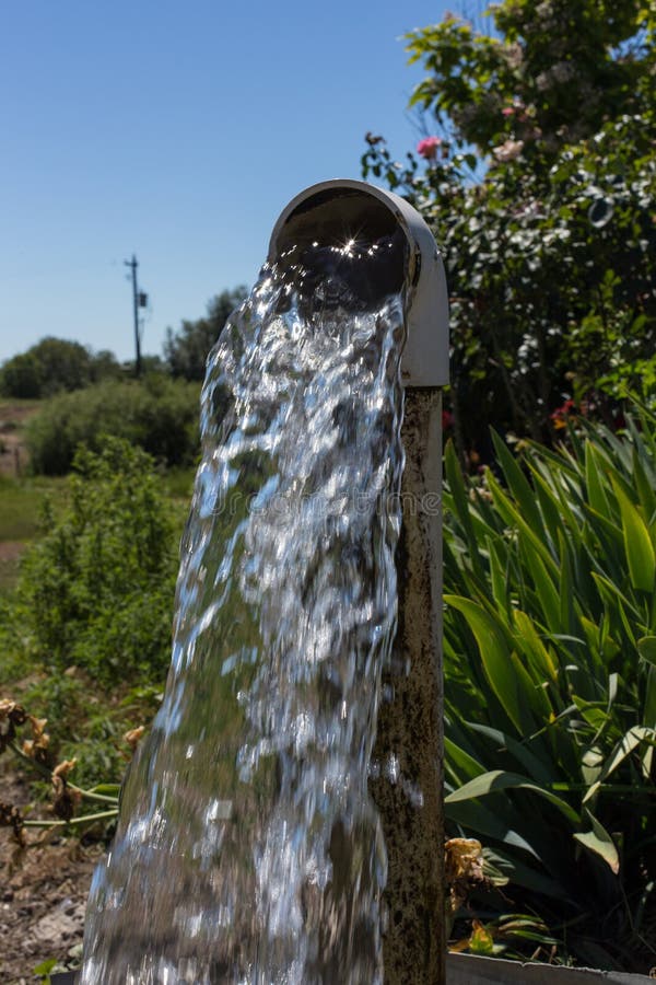 Water Flowing from a Well Pipe Stock Image - Image of stream, clean ...