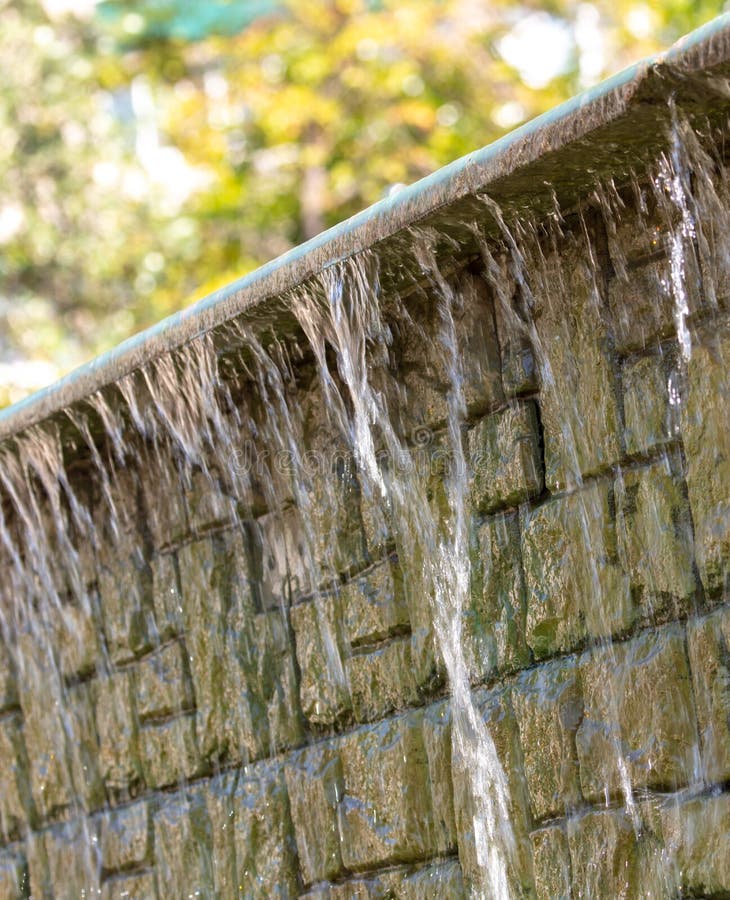 Water Flows Along a Brick Wall Stock Image - Image of travel, fresh ...
