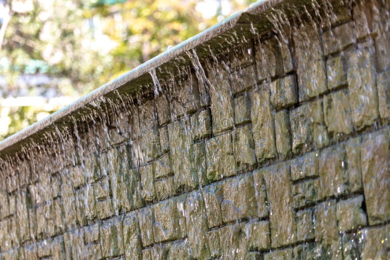 Water Flows Along a Brick Wall Stock Image - Image of drop, artificial ...
