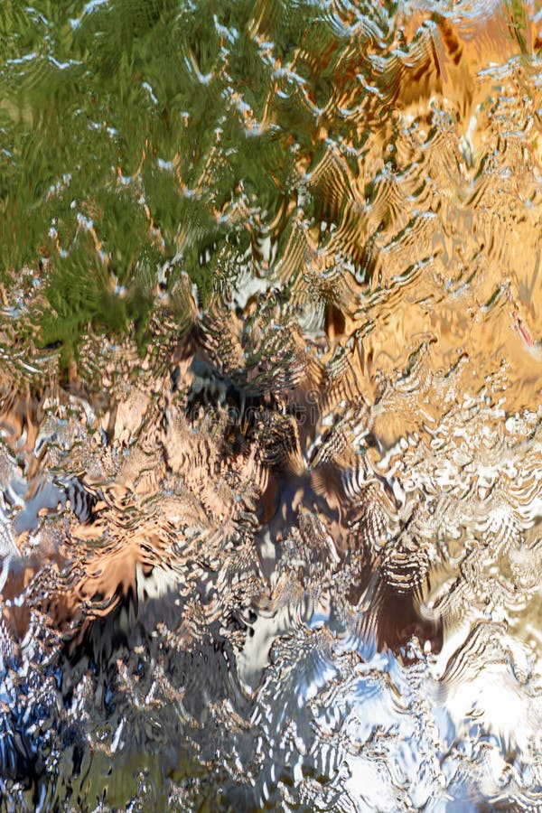 Water Flows Along the Wall of the Mirror, Vertical Abstract Background ...