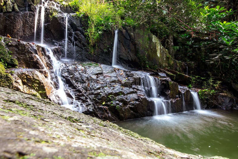 Water Flows Down the Rocks. Waterfall in a Park Stock Image - Image of ...