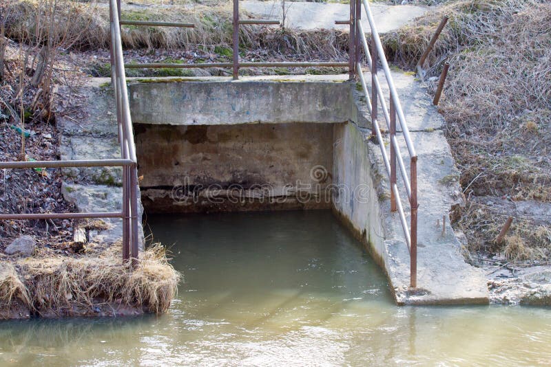 Water Flows Down a Stream Underground Stock Photo - Image of concrete ...