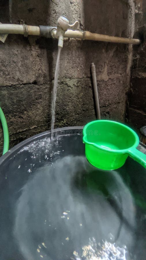 Water Flows from a Faucet, is Collected in a Basin, Then Used for ...