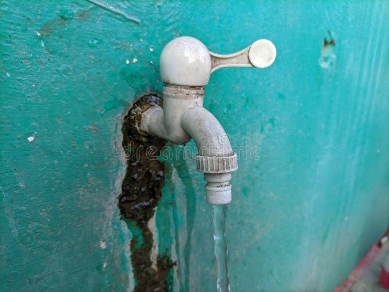 Water Flows through the Faucet. Stock Photo - Image of monument, flows ...