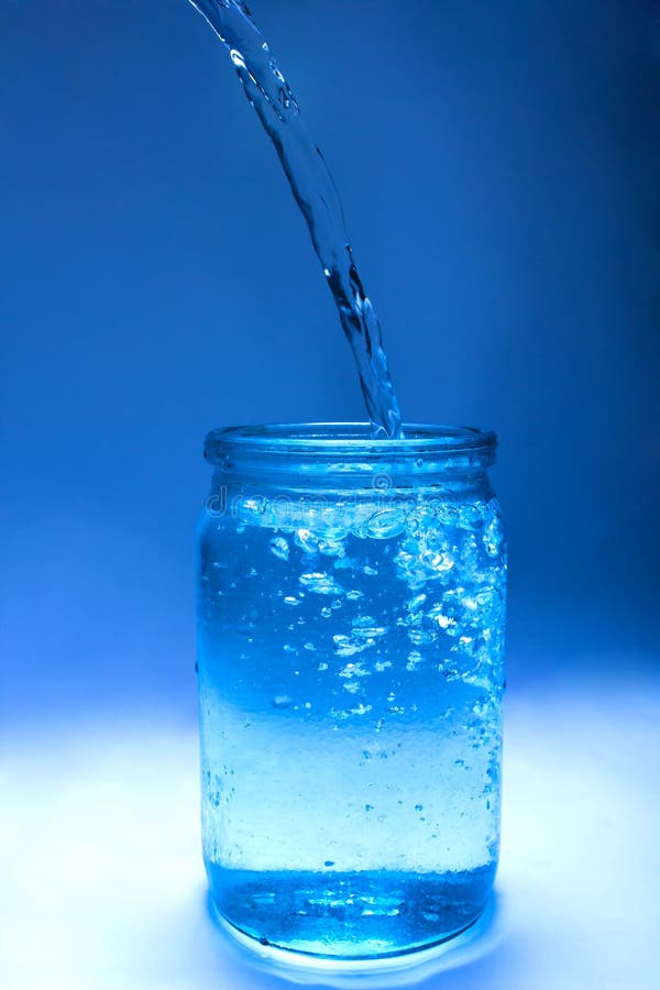 Water Flows into a Glass Jar Stock Image - Image of blue, glass: 19259073