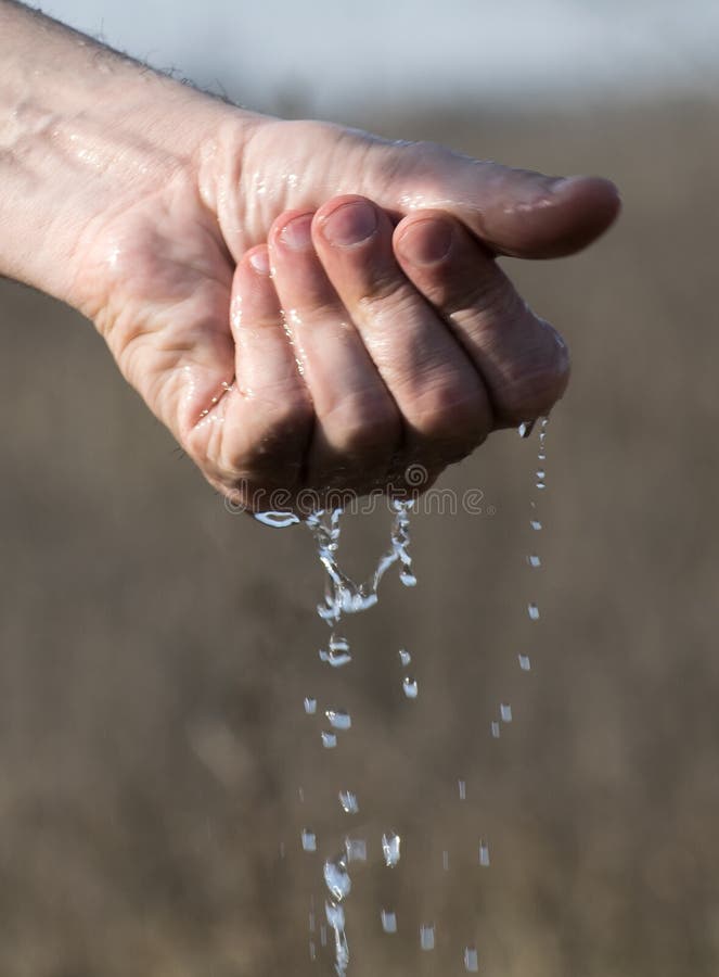 Water Flows into the Hands of a Man. Hand Cleaning Stock Image - Image ...