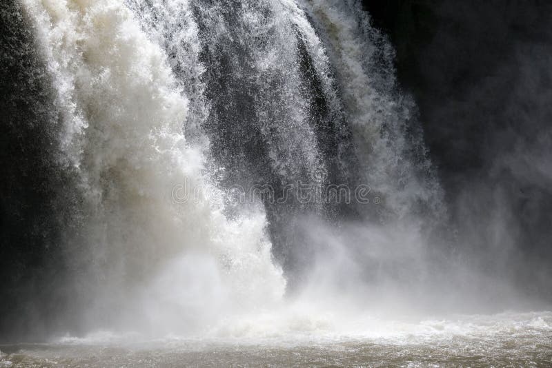 The Water Flows a Lot from the Cliffs of a Natural Waterfall. Fullness ...