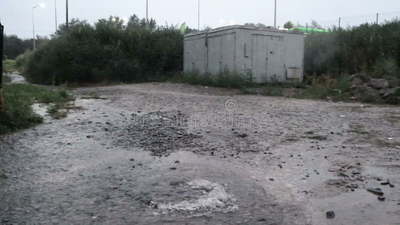 Water Flows Out of the Broken Sewer Manhole at Rainy Day Stock Video ...