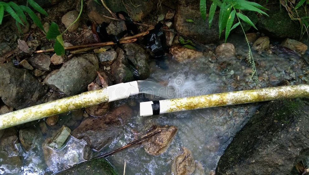 Water Flows Out of the Pipe Connection in a Torrent. Taking Water from ...