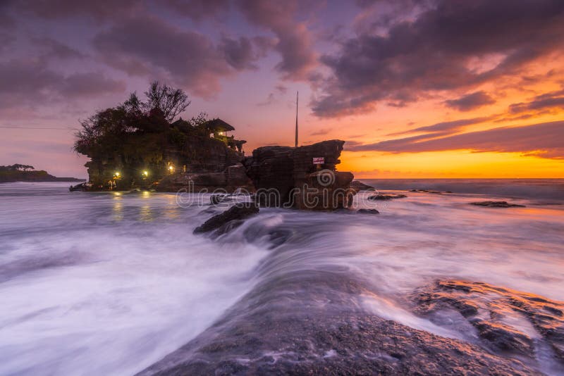 Water Flows Over an Island Temple with Sunset Sky Stock Photo - Image ...