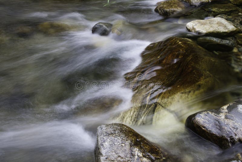 Water Flows Over Large Rock. Stock Image - Image of clear, river: 26454347