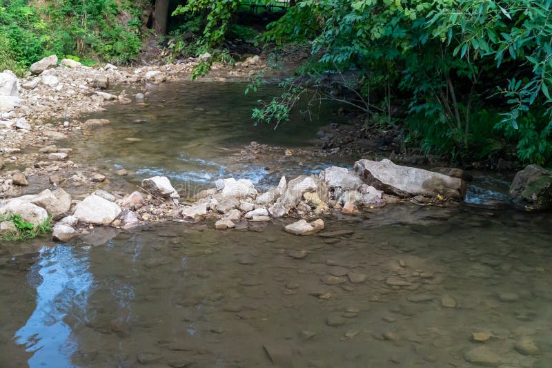 Water Flows Over Rocks in a Mountain River Stock Photo - Image of stone ...