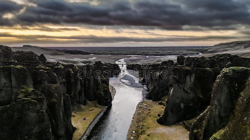 The Water is Running into the River in the Wilderness Near Large Rocks ...