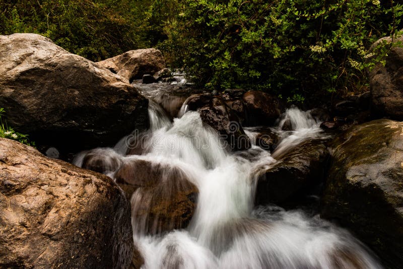 Water Flows between the Rocks Stock Photo - Image of water, stream ...
