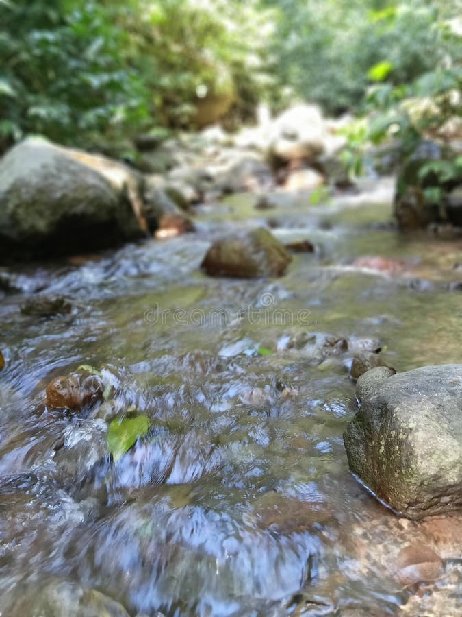 Water Flows between Rocks in Natural River Stock Photo - Image of rocks ...