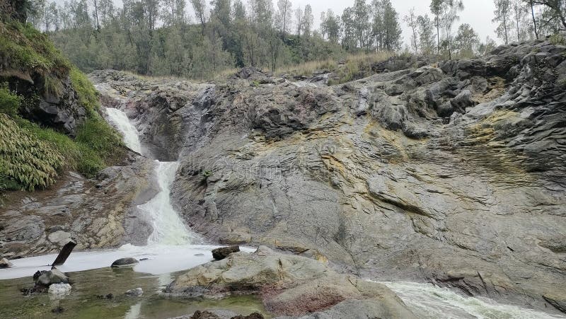 Water Flows from between the Rocky Hills Stock Image - Image of flows ...