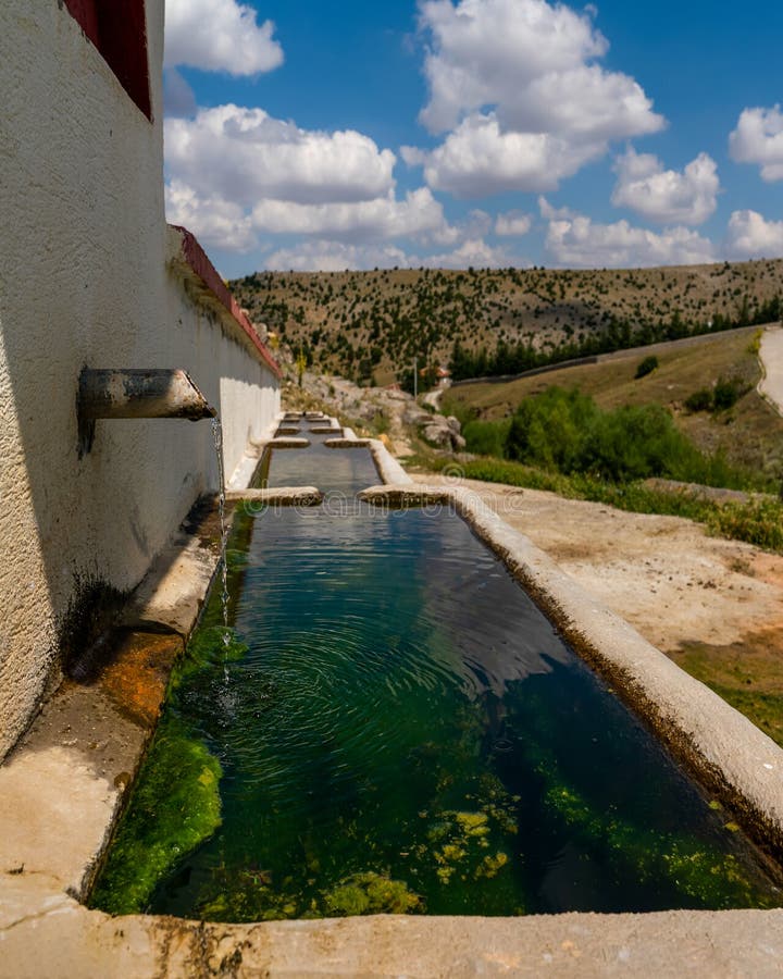 Water Flows from the Spring To the Concrete Animal Troughs Lined Up One ...