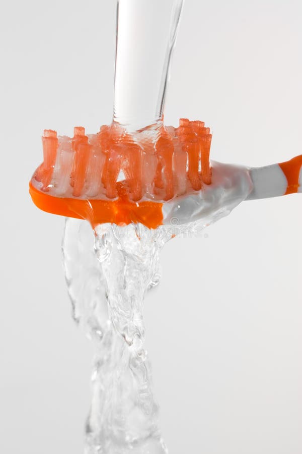 Water Flows To the Toothbrush Stock Photo - Image of pouring, isolate ...