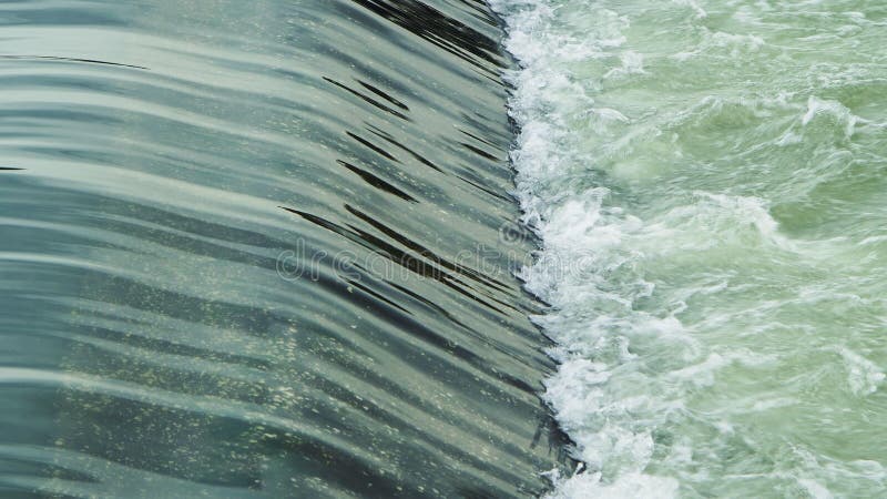 Water Flows from the Weir of a Large Dam Stock Footage - Video of ...