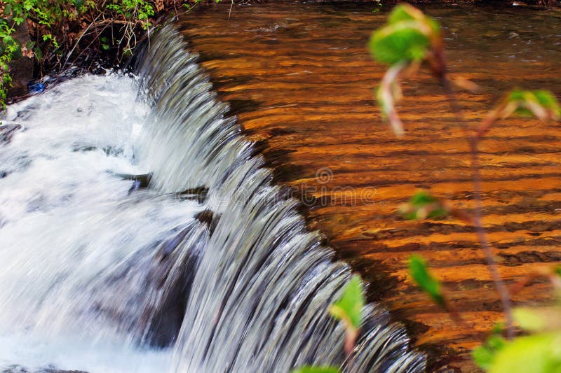 Water Flows through the Wooden Logs, Falling Cascade Down Stock Photo ...
