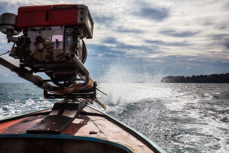 Engine And Wake Of Motor Boat Speeding Across Lake Surrounded By Stock ...