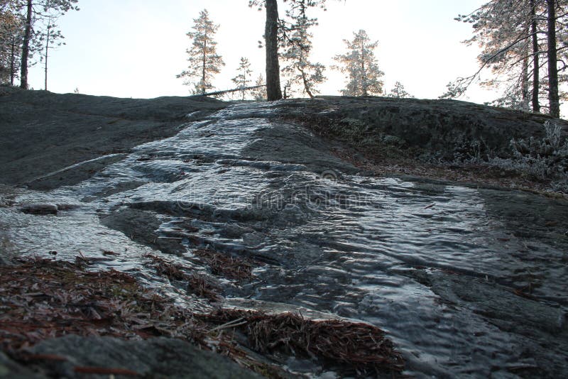 The Water Forms Great Works of Art on the Rocks. Stock Photo - Image of ...