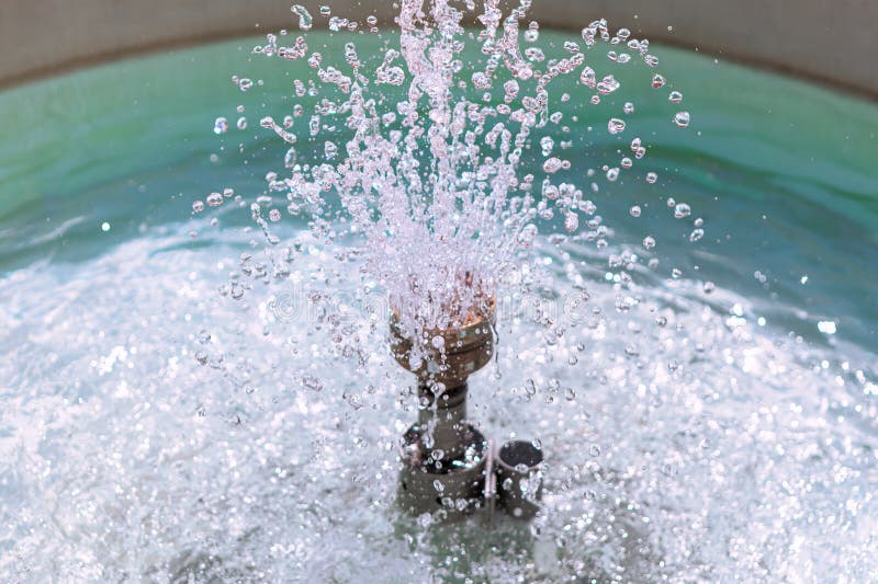 Water Fountain with Water Splashes Stock Image - Image of sink, green ...