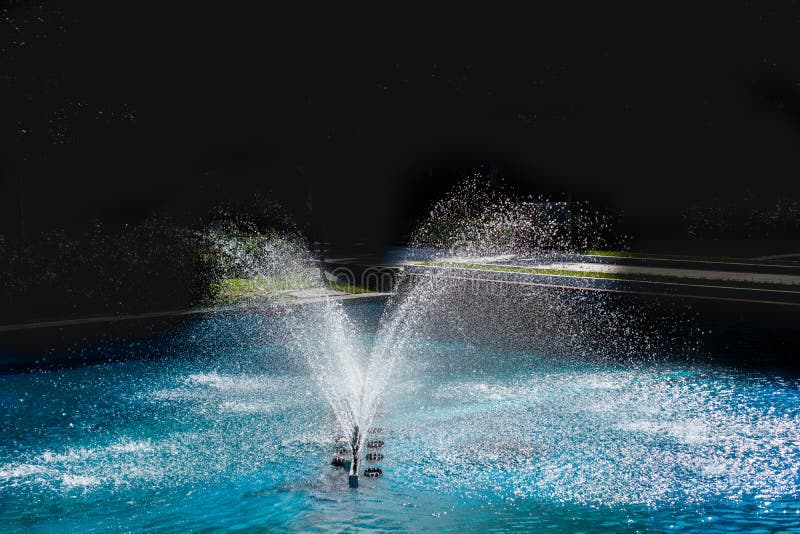 A Water Fountain Sprinkling Water on Display Stock Photo - Image of ...