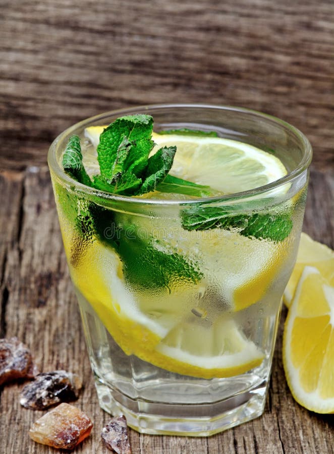 Water with Fresh Lemon and Mint in a Glass Stock Image - Image of ...