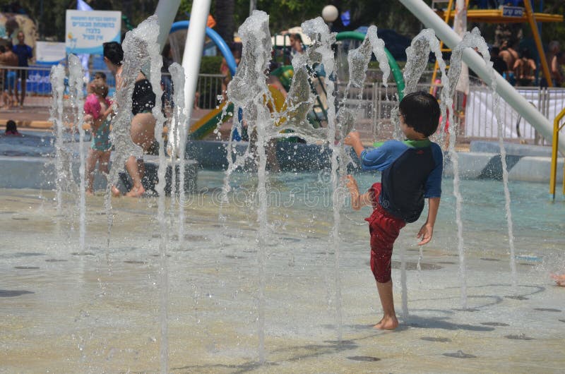 Water fun in summer editorial stock image. Image of running - 44005679