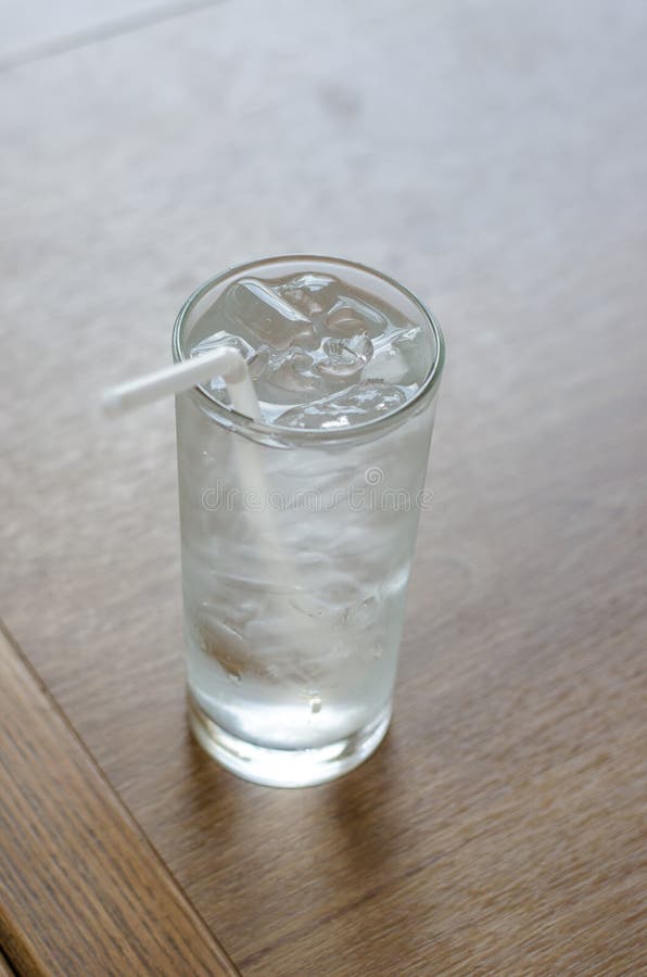 Ice Water in Glass on Table and TubeIce Water in Glass on Table Stock ...