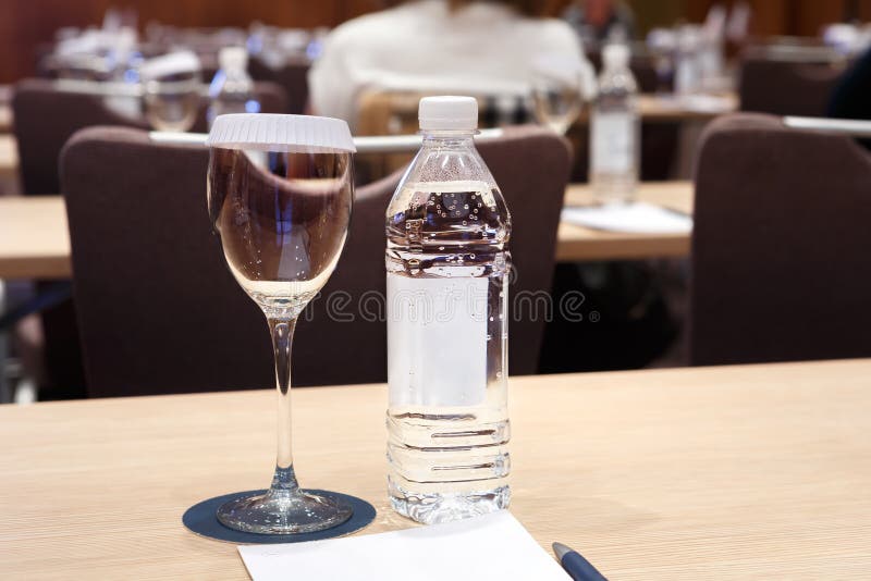Water, Glass and Notebook on the Table Stock Image - Image of liquid ...