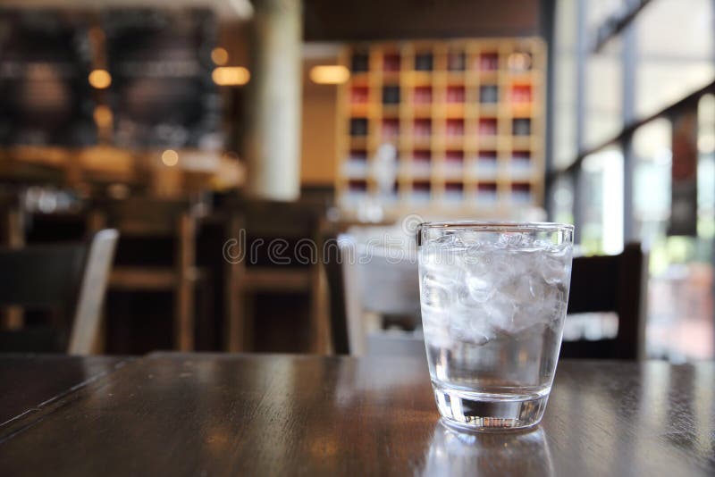 Water glass in restaurant stock image. Image of white - 108859043