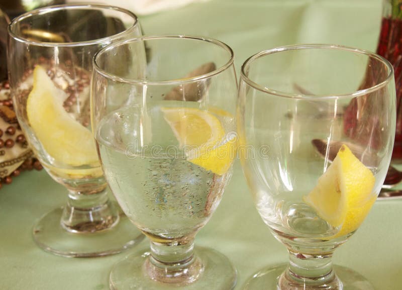 Water Glasses with Lemon stock image. Image of restaurant - 76621361